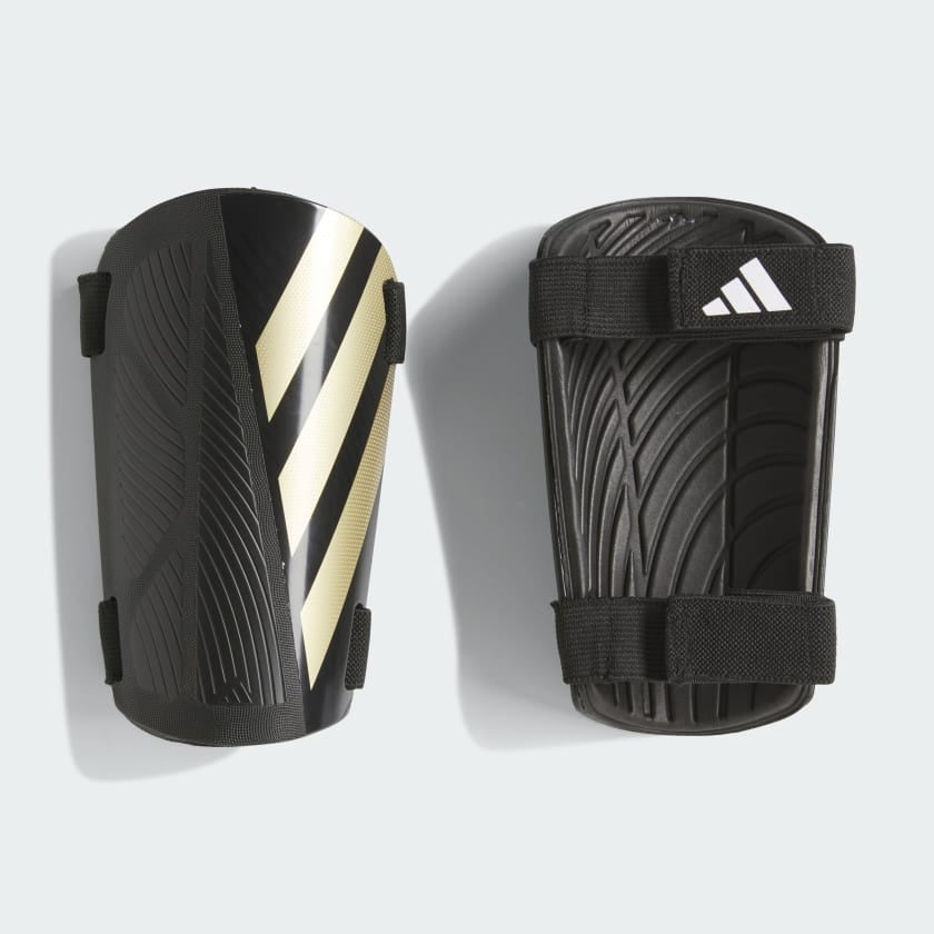 Canilleras Adidas Tiro SG TRN Negra Adulto– 100% Fútbol